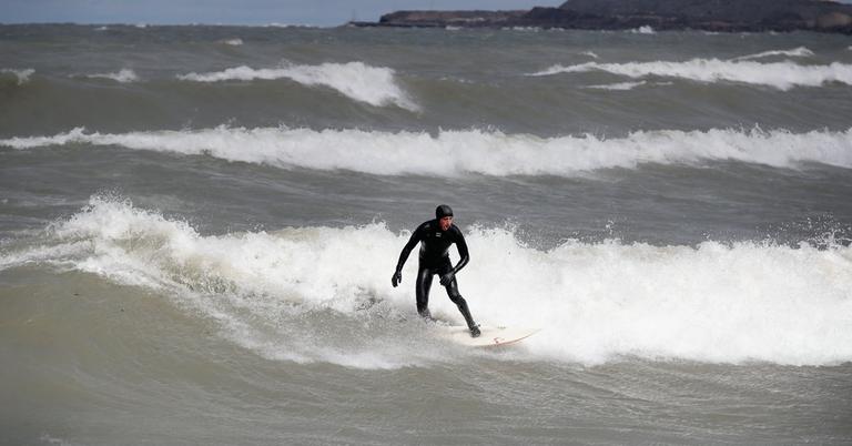 Surfing Lake Michigan: The Most Adventurous Fall Activity Out There