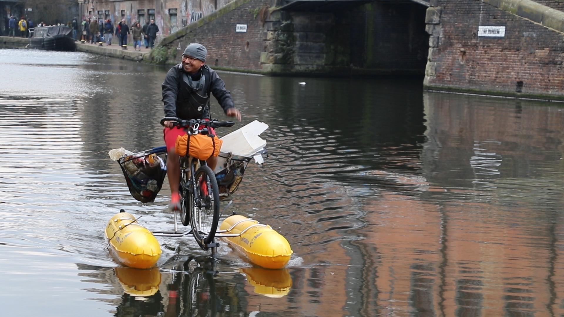 This Man Rides Floating Bike While Collecting Plastic Pollution